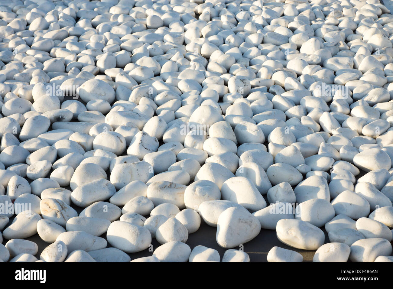 White pebble stones background Stock Photo - Alamy