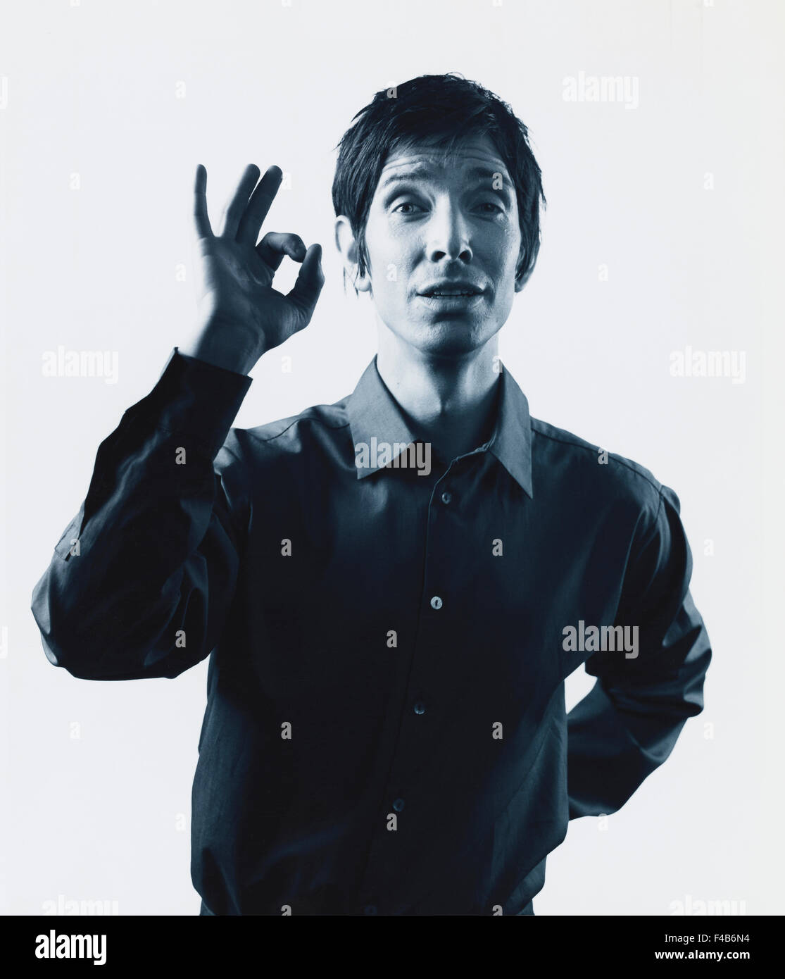 Man making the ok sign with fingers hi-res stock photography and images ...