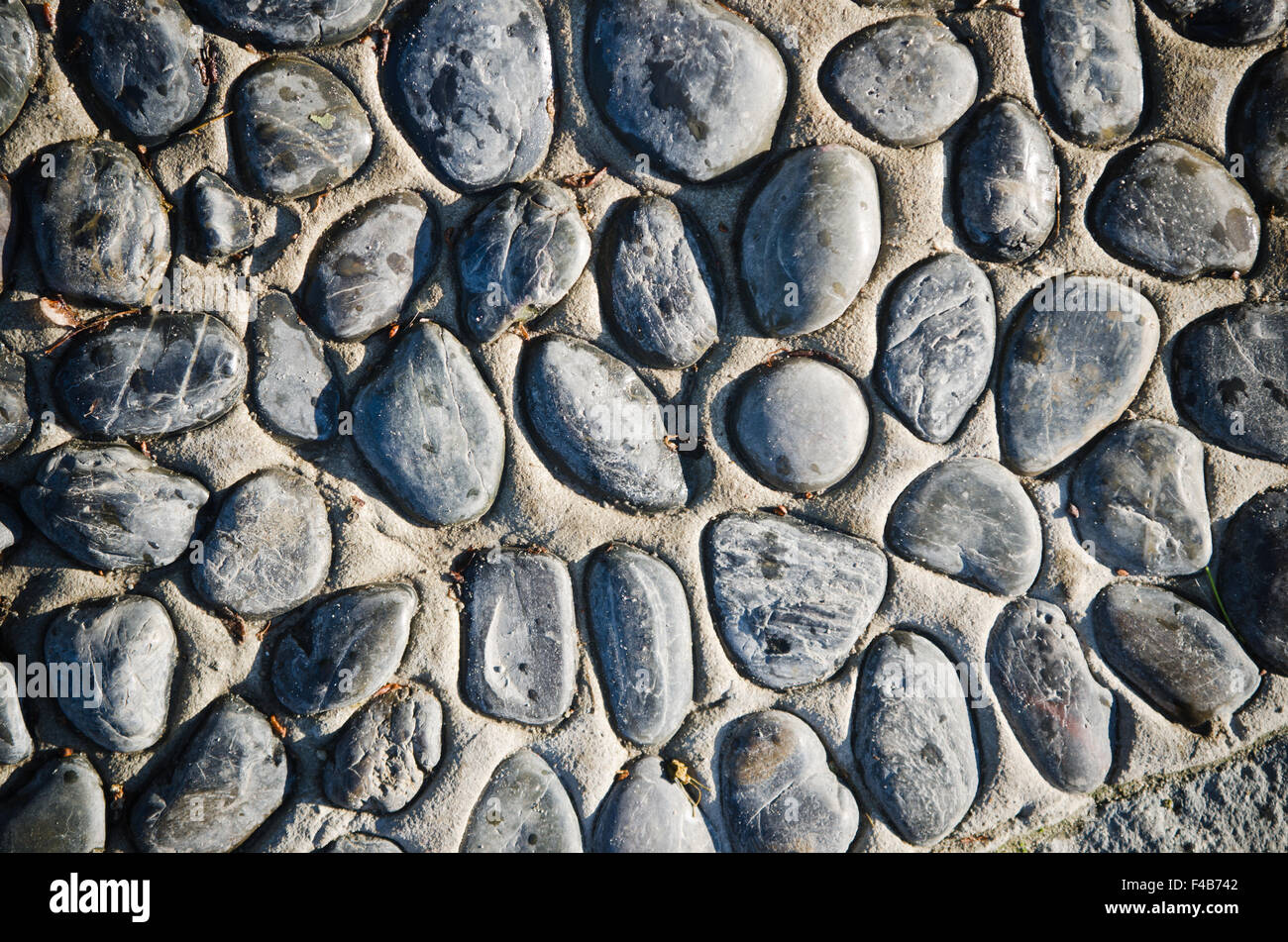 Cobblestone road a close up Stock Photo - Alamy