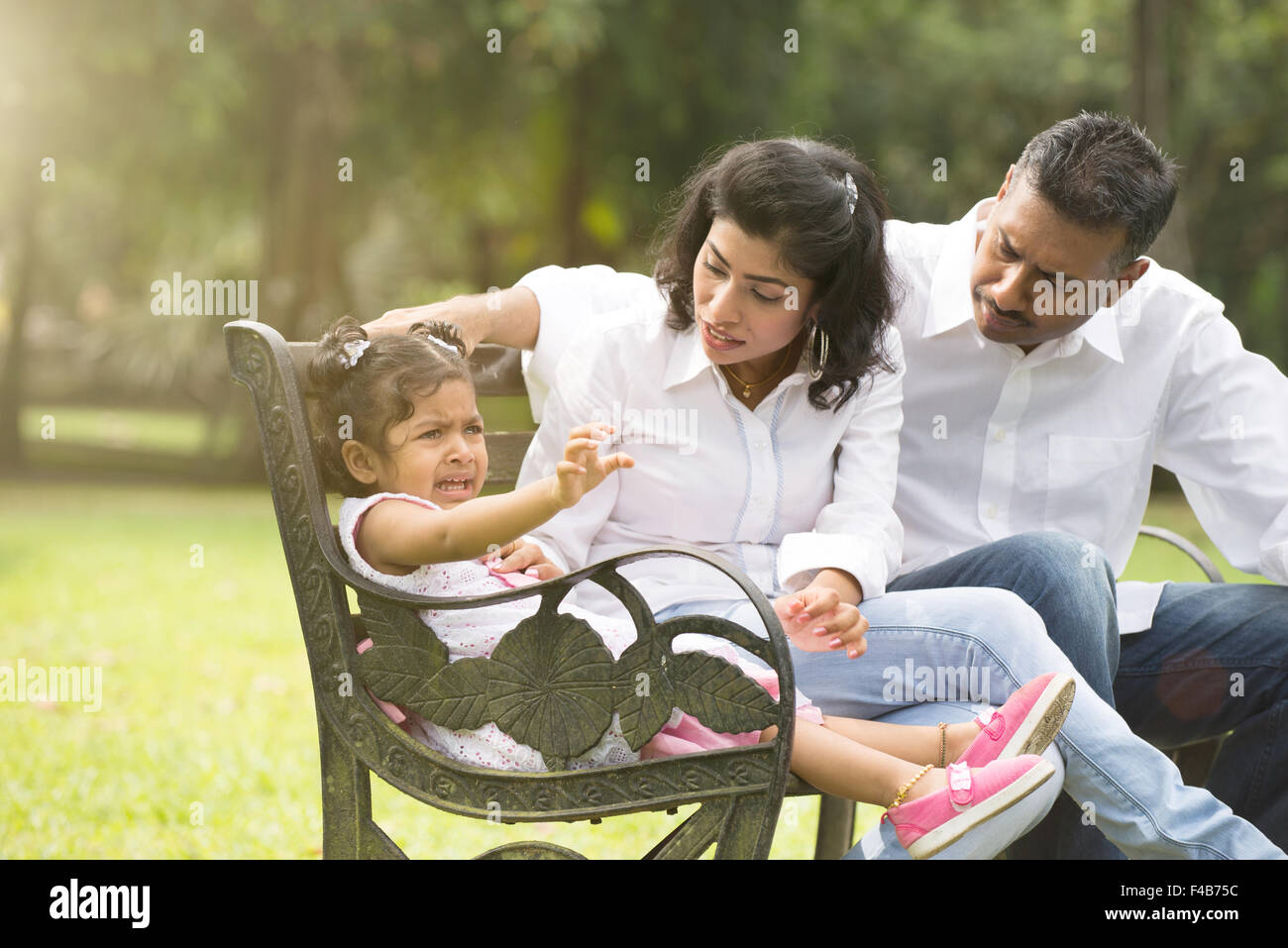 indian parent dealing with daughter with tantrum Stock Photo - Alamy