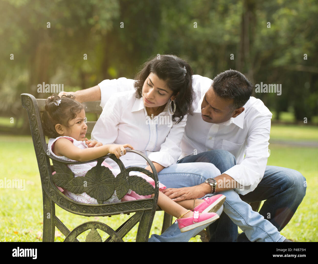 indian parent dealing with daughter with tantrum Stock Photo - Alamy