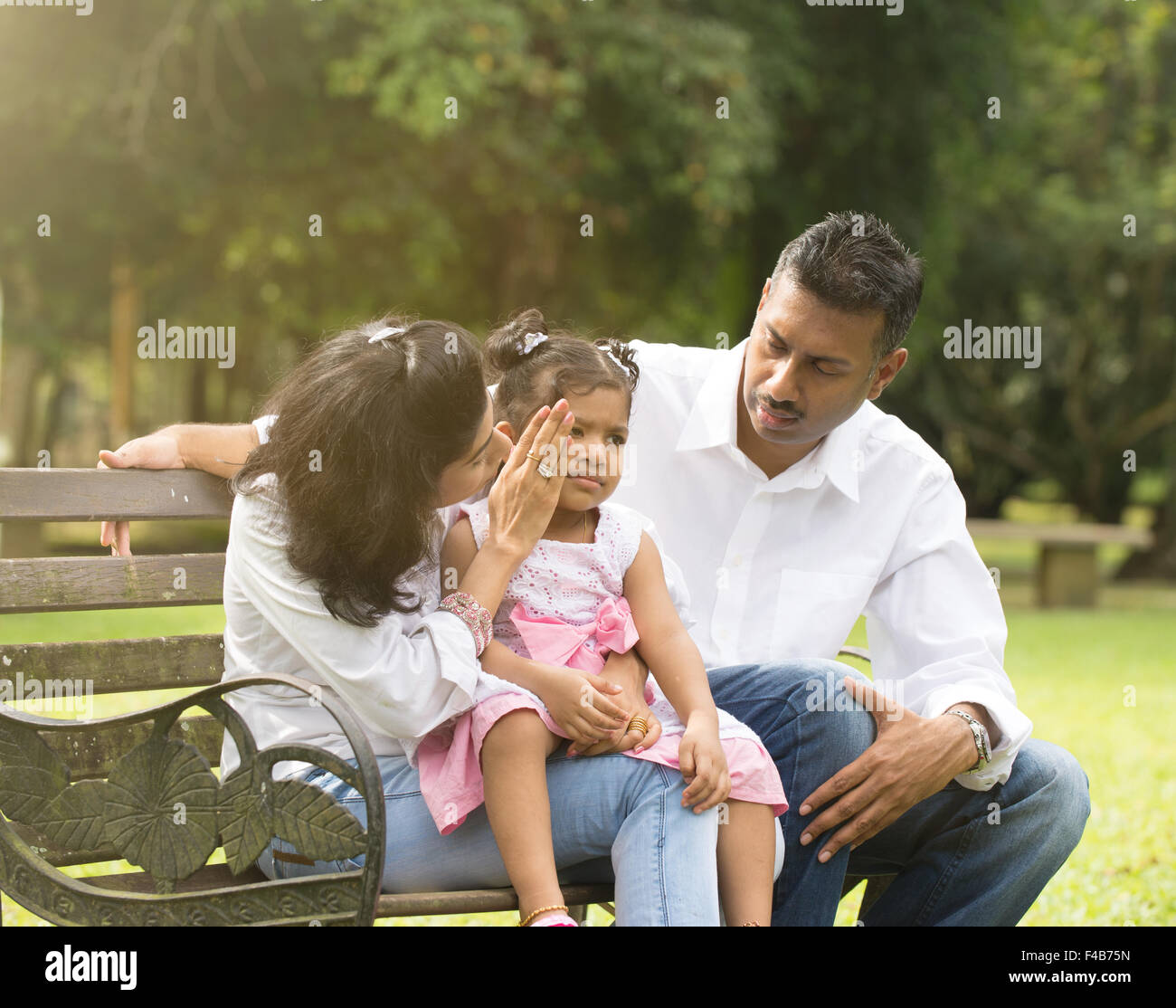 indian parent dealing with daughter with tantrum Stock Photo - Alamy