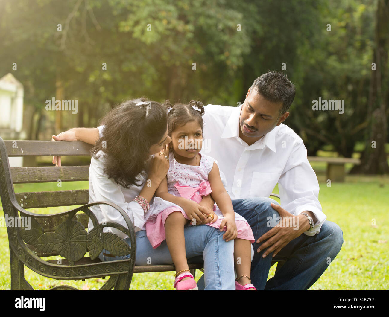 indian parent dealing with daughter with tantrum Stock Photo - Alamy