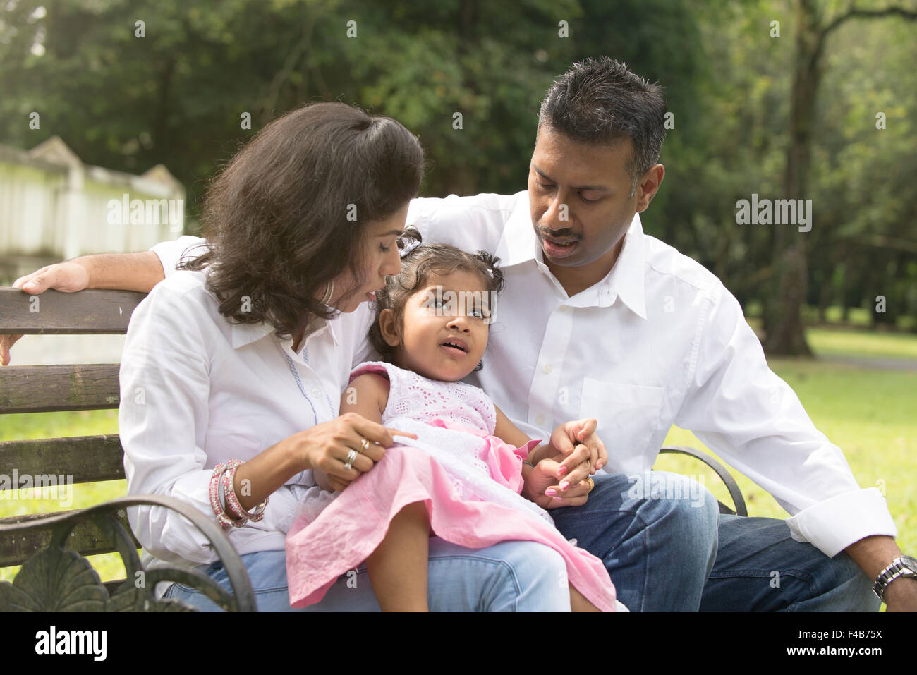 indian parent dealing with daughter with tantrum Stock Photo - Alamy
