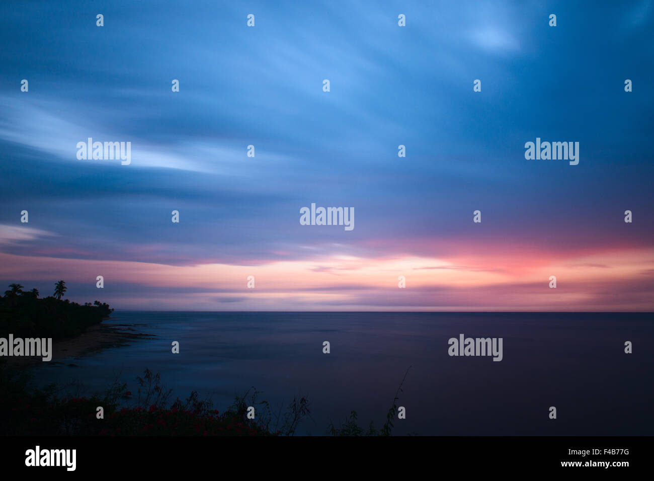 Rincon – Puerto Rico, Barrio Puntas Sunset with water motion Stock ...