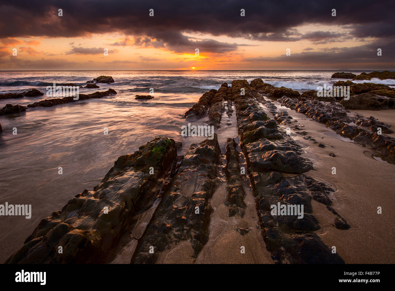 Rincon – Puerto Rico, Sunset with water motion Stock Photo - Alamy