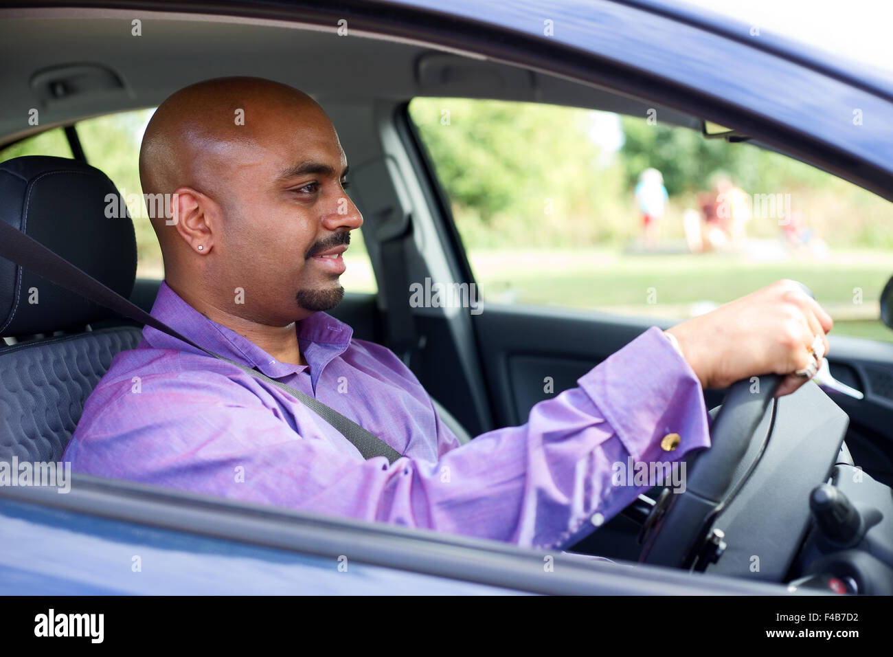 young man driving his car Stock Photo - Alamy