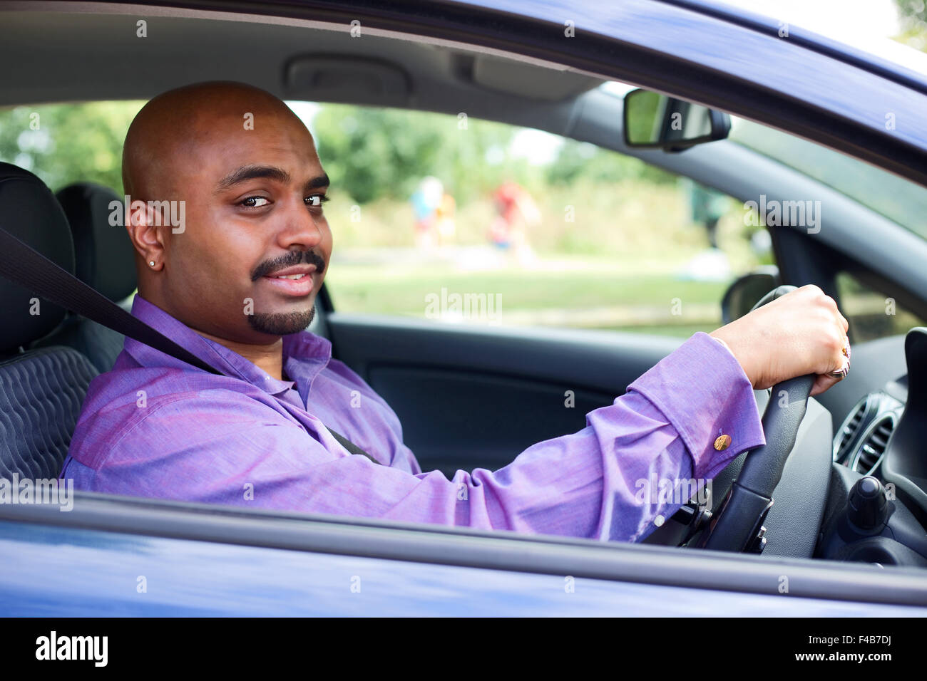 young man driving his car Stock Photo - Alamy