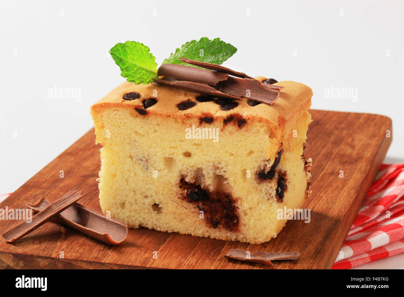 piece of chocolate chip sponge cake Stock Photo - Alamy