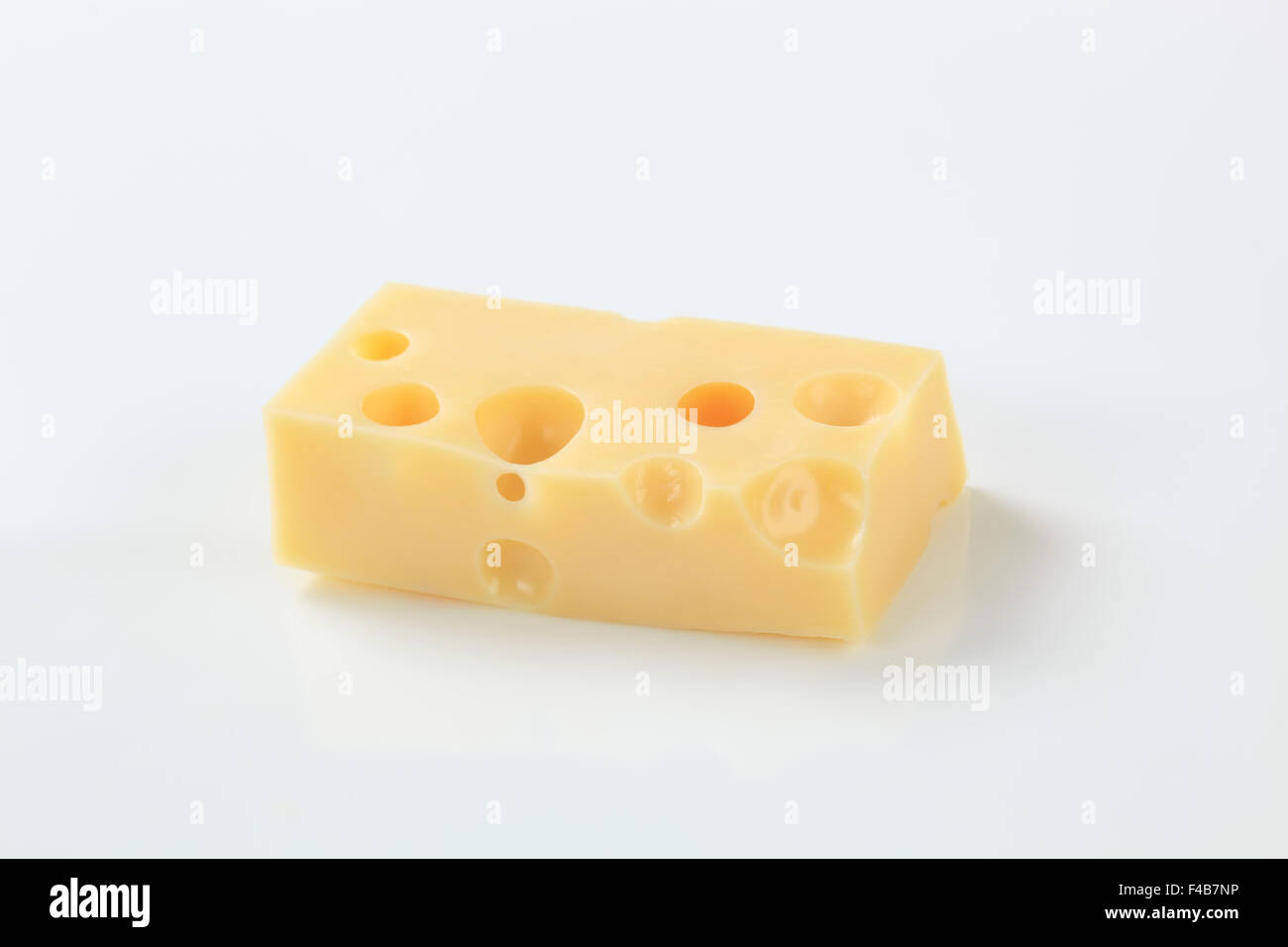 small piece of emmental cheese Stock Photo - Alamy