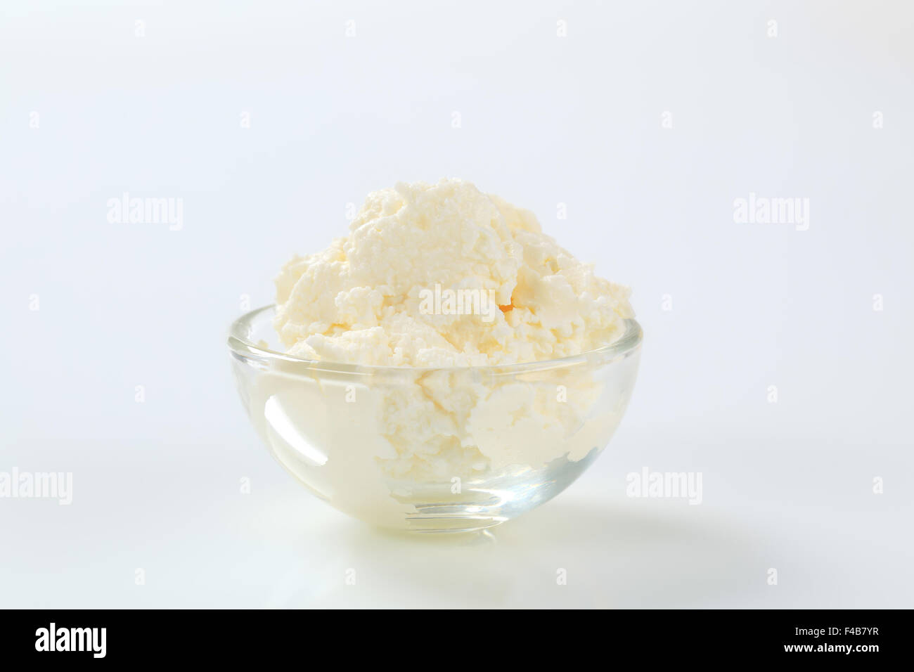 white creamy cheese in a small glass bowl Stock Photo - Alamy