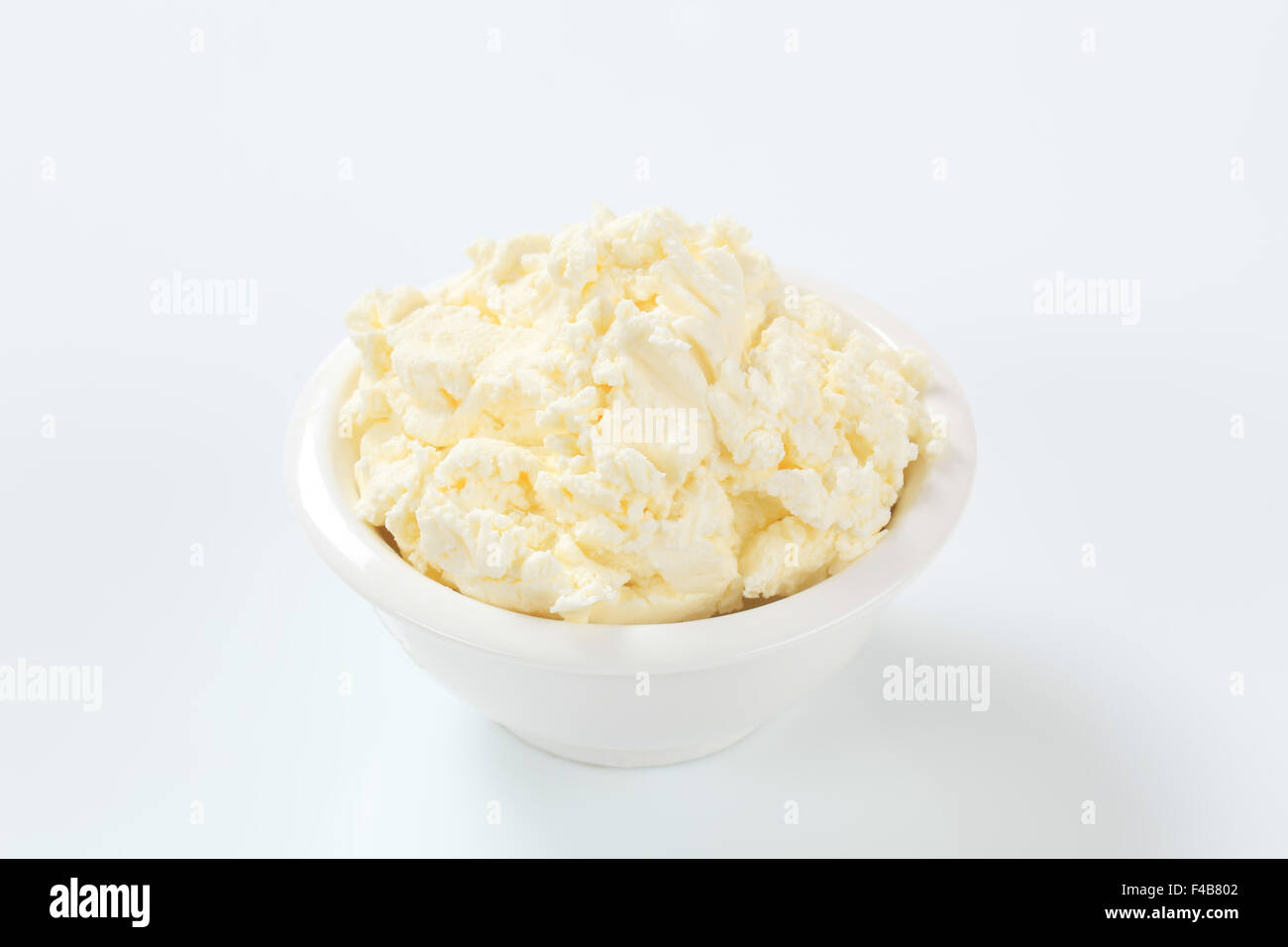 white creamy cheese in a small bowl Stock Photo - Alamy