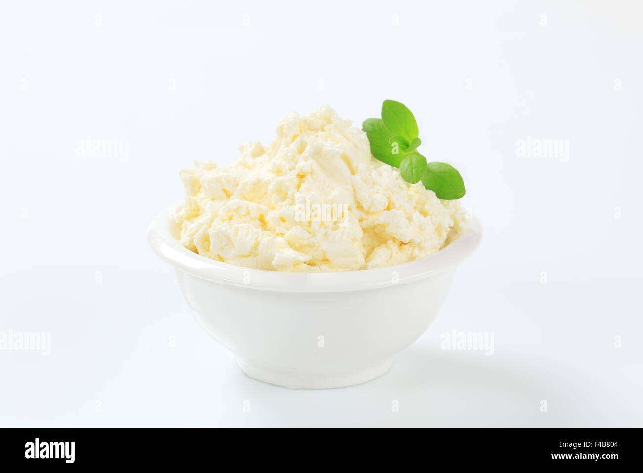 white creamy cheese in a small bowl Stock Photo - Alamy