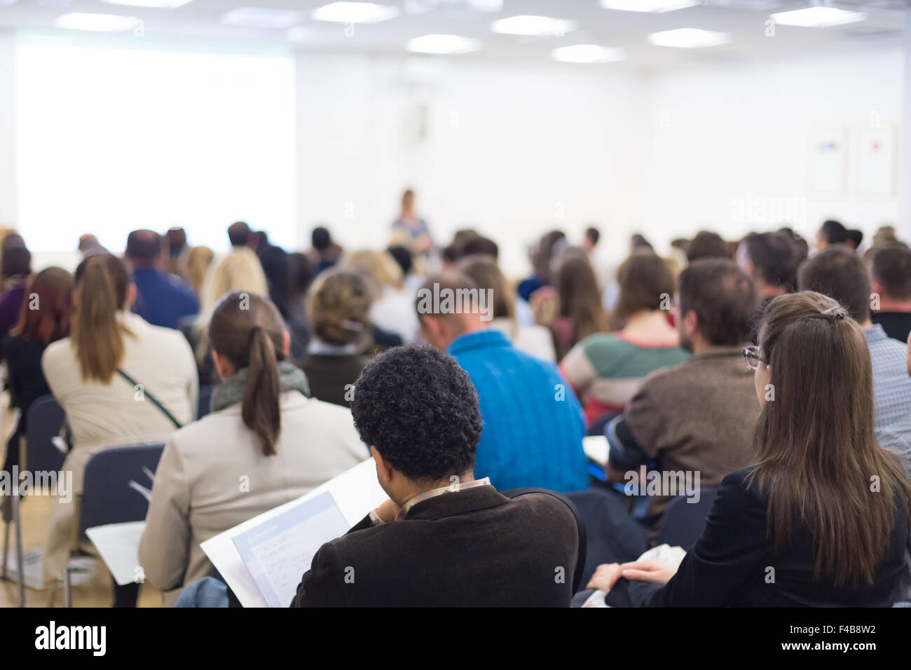 Audience in the lecture hall Stock Photo - Alamy