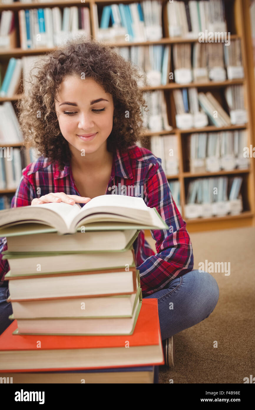 Books library girl hi-res stock photography and images - Alamy