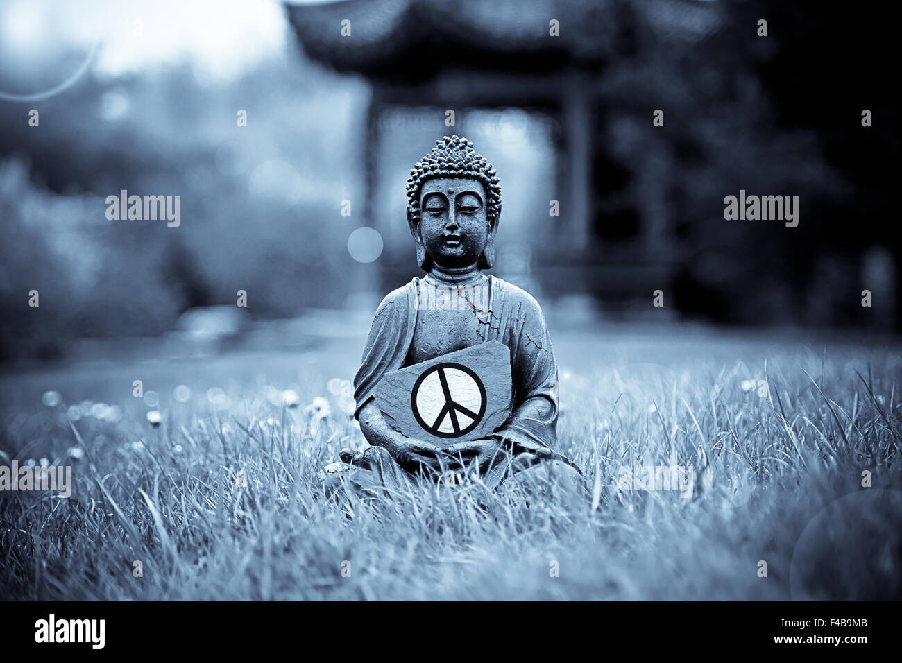 The Peace Sign with Buddha Statue Stock Photo - Alamy