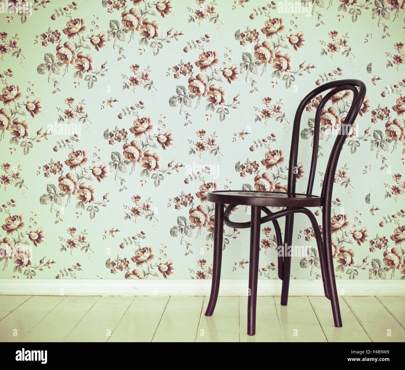 One classic chair against a wall and floor Stock Photo - Alamy