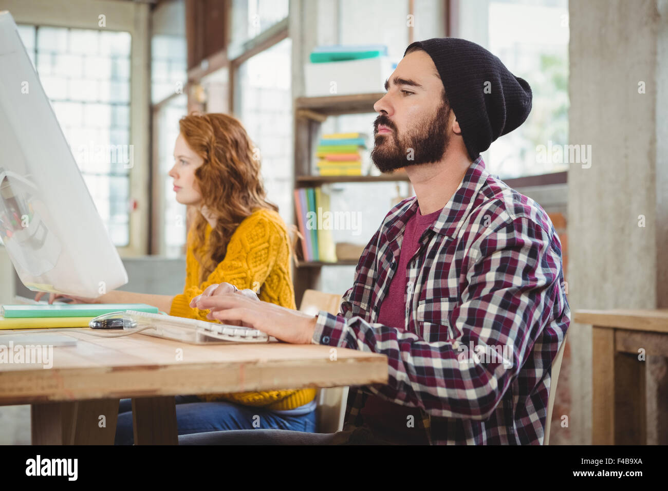 Young serious busy woman hi-res stock photography and images - Alamy