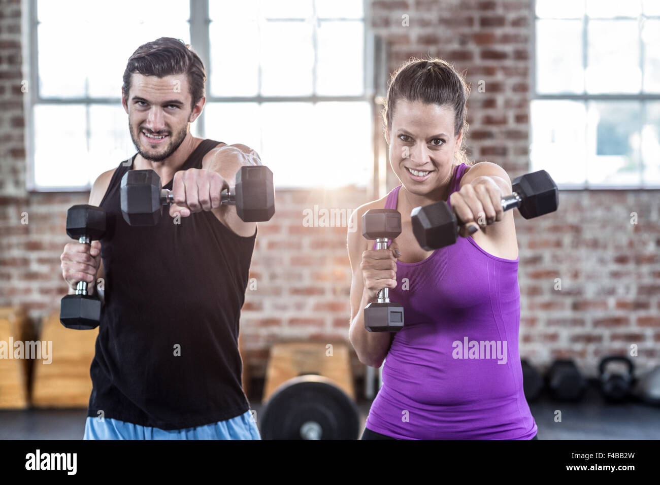 Man lifting gym smiling hi-res stock photography and images - Alamy