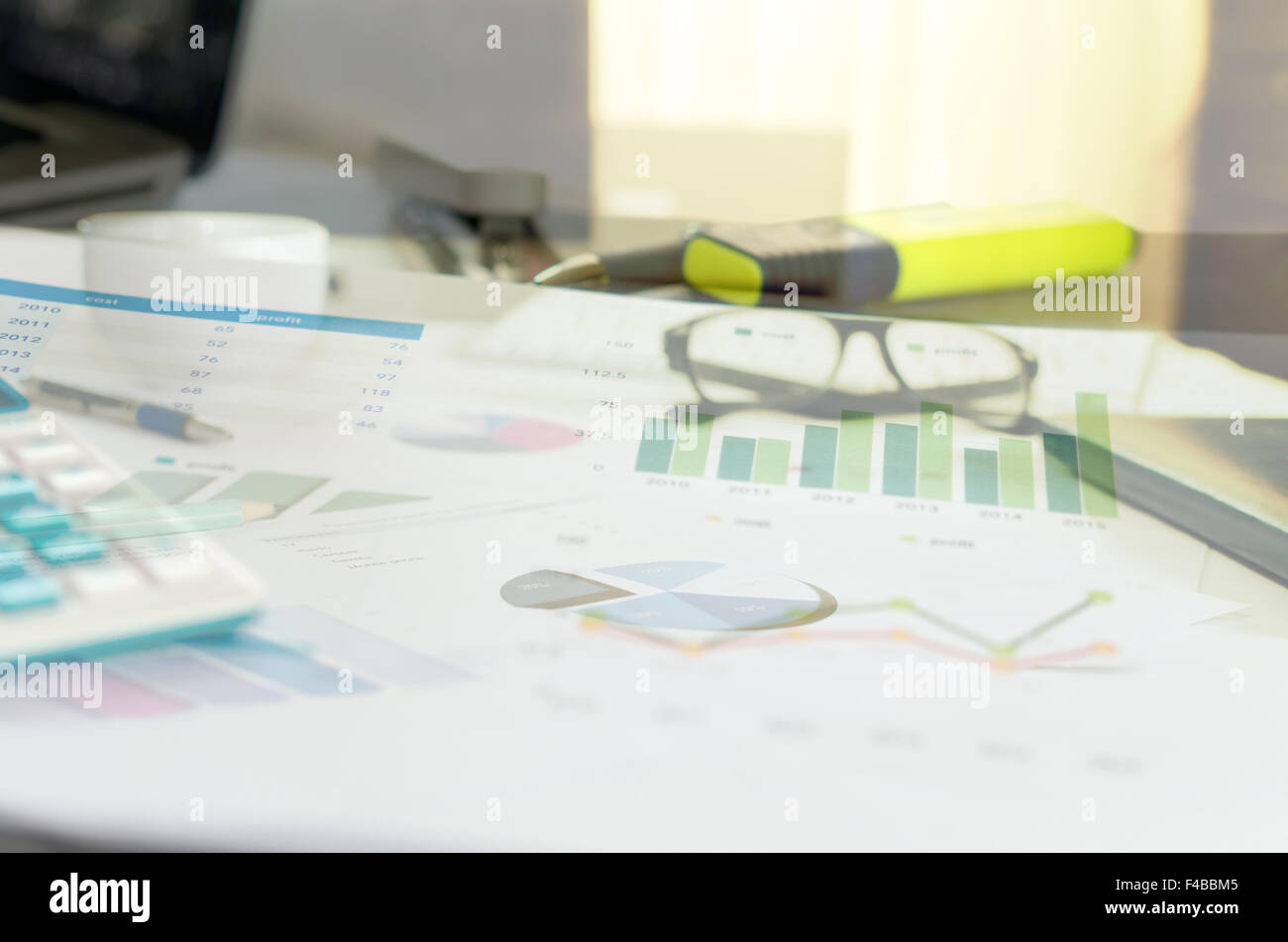 Graphs and charts, business table. The workplace of business people ...