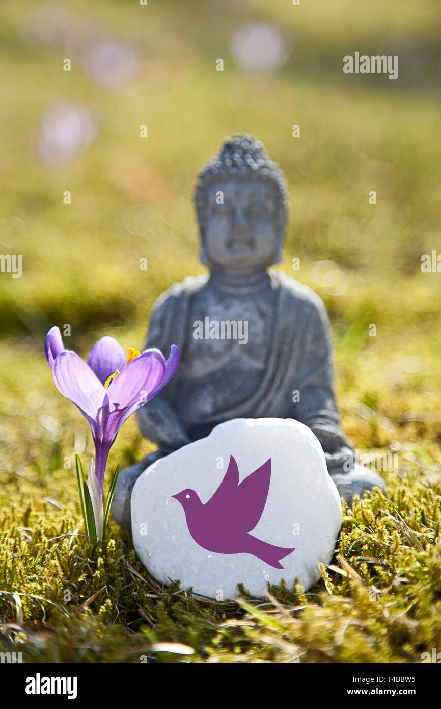 Symbol of Peace with Buddha Statue Stock Photo - Alamy