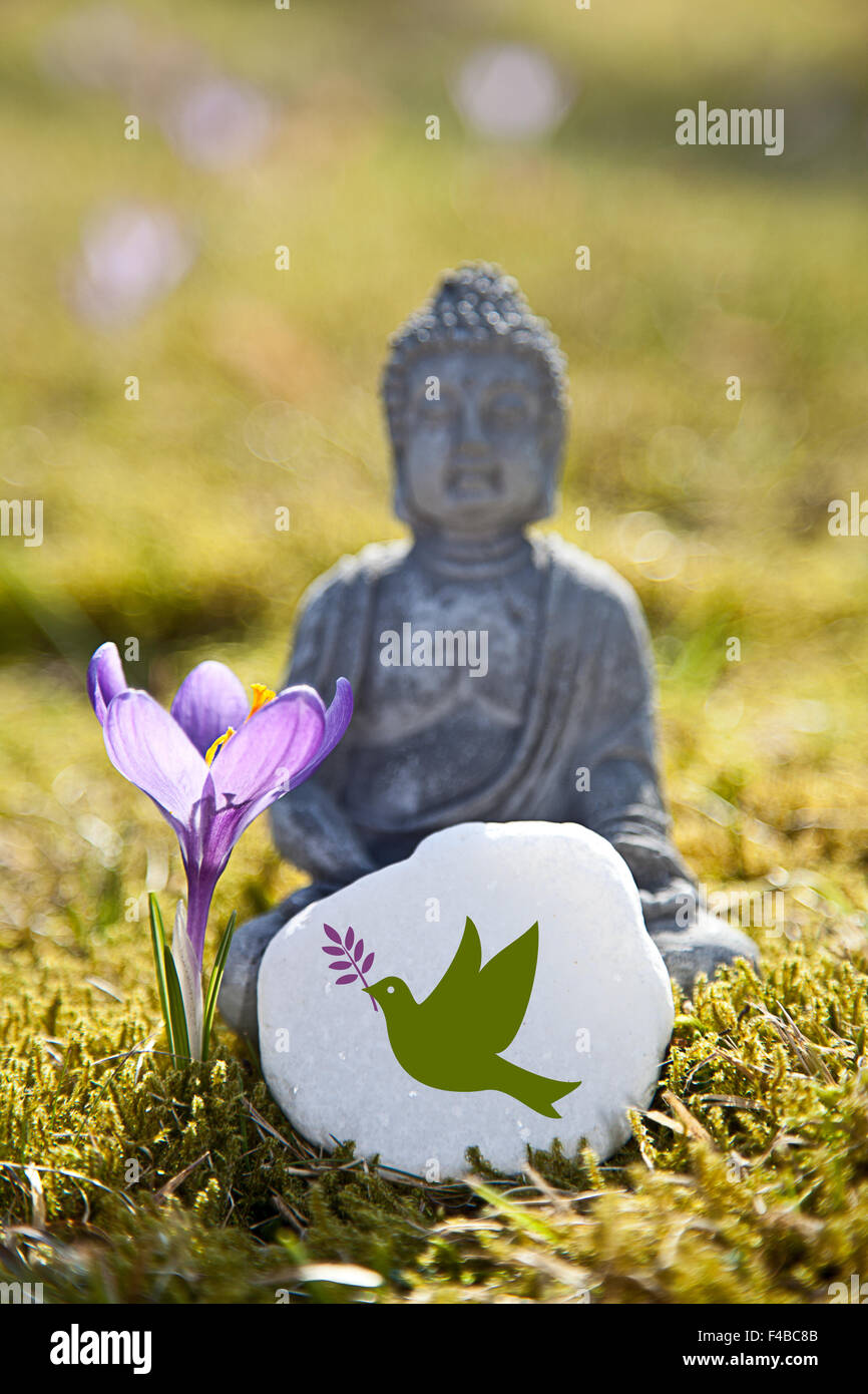Symbol of Peace with Buddha Statue Stock Photo - Alamy