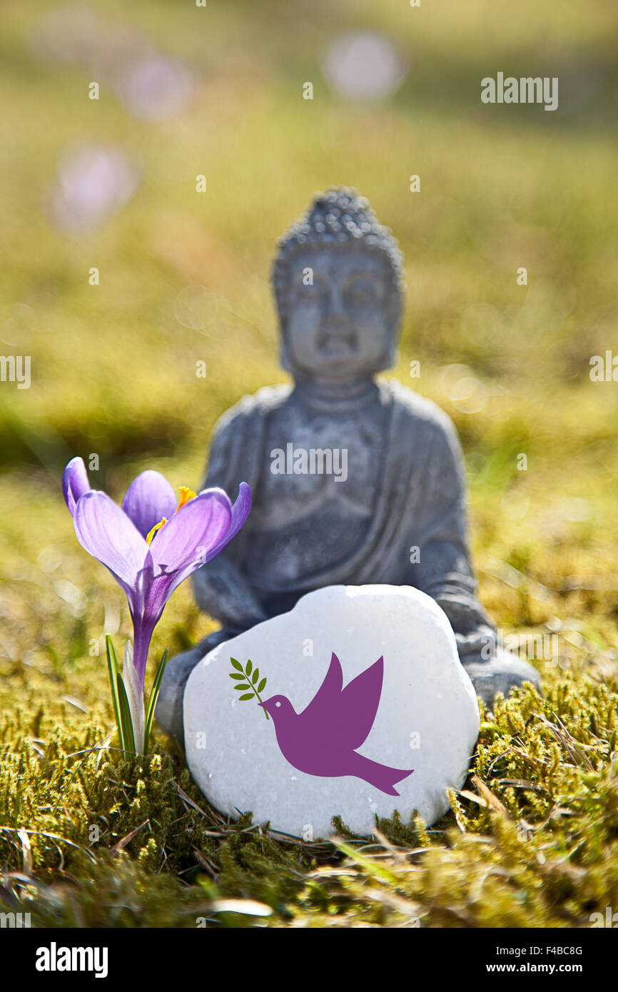Symbol of Peace with Buddha Statue Stock Photo - Alamy