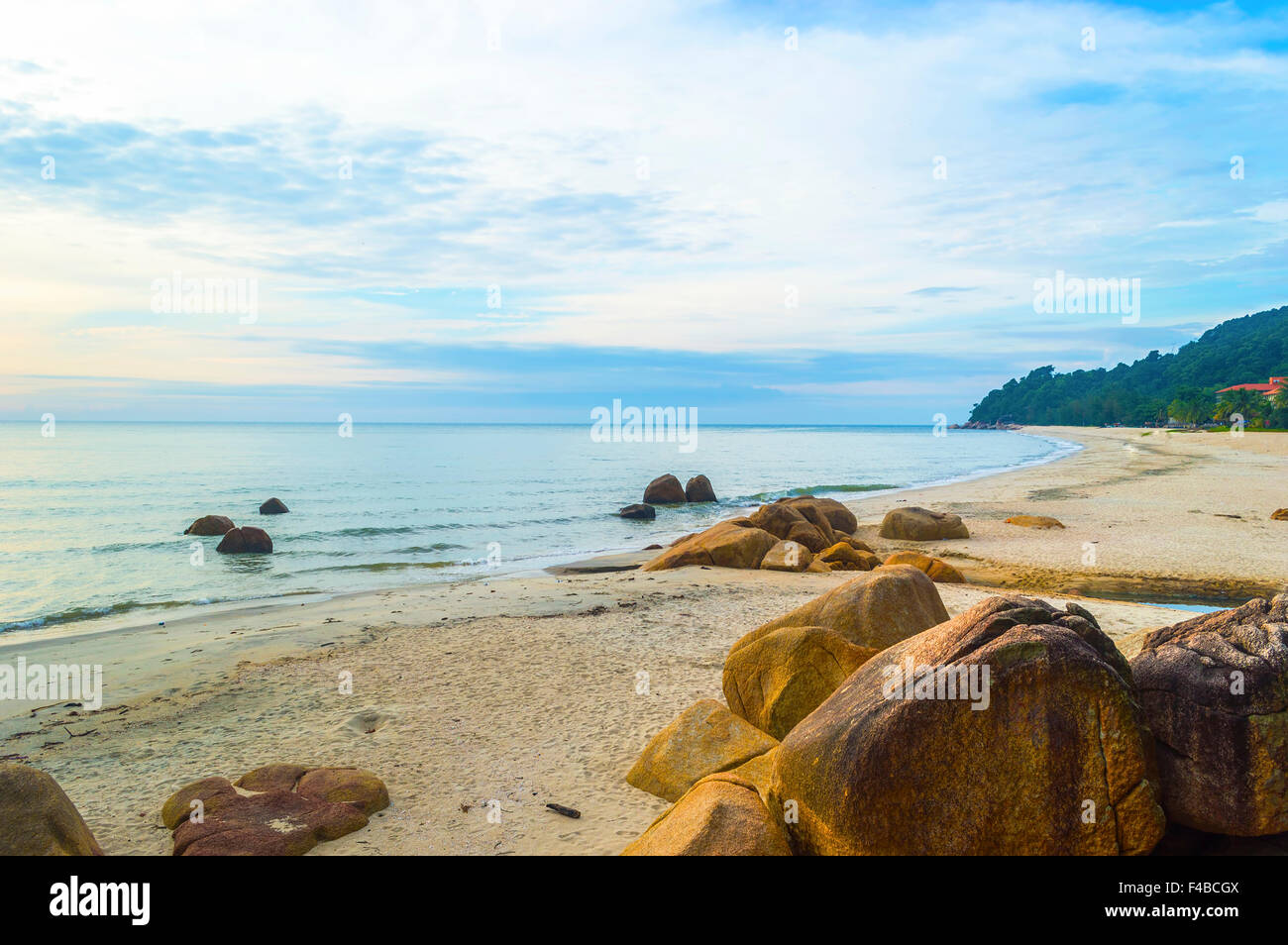 Rock beach at sea shore Stock Photo - Alamy