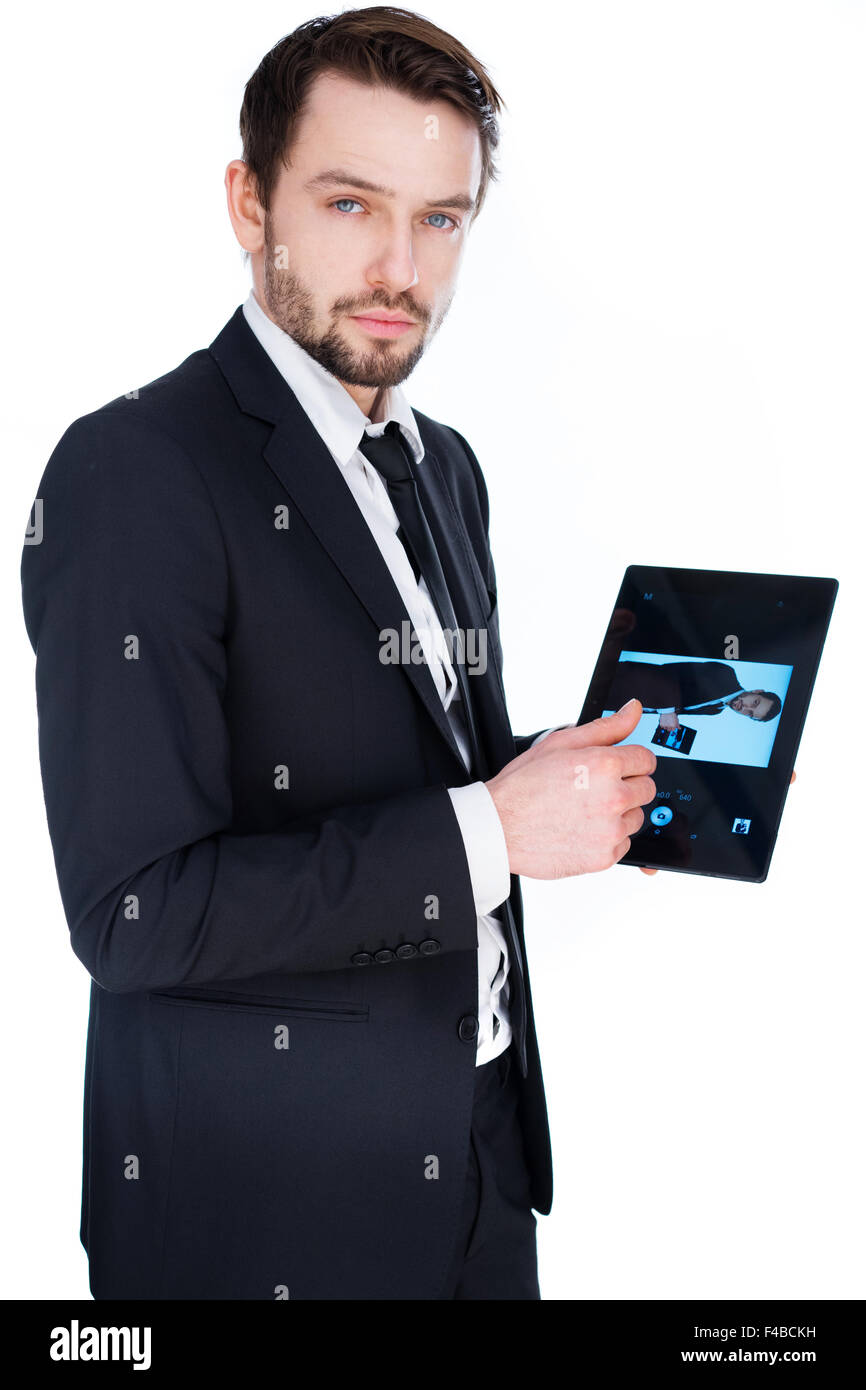 Man displaying a handheld tablet computer Stock Photo - Alamy