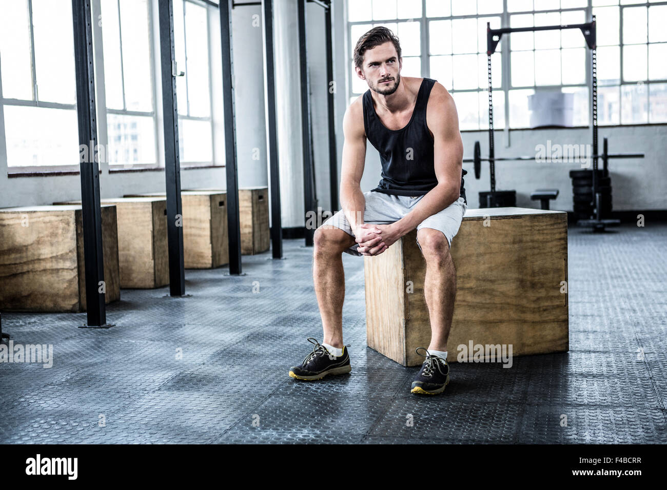 Fit man taking a break from working out Stock Photo - Alamy