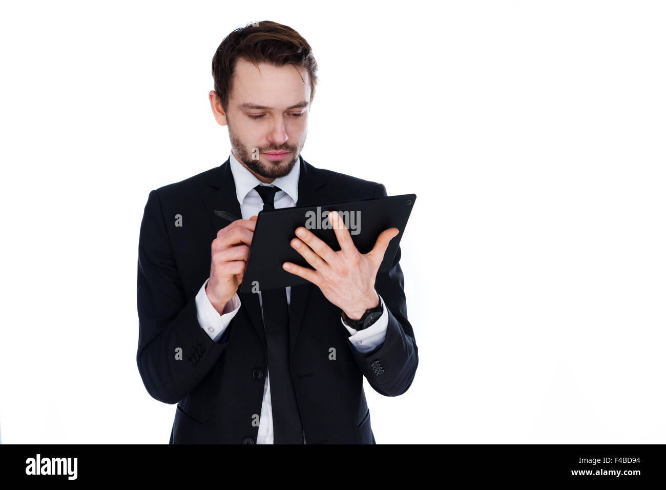 Businessman using a portable notepad computer Stock Photo - Alamy