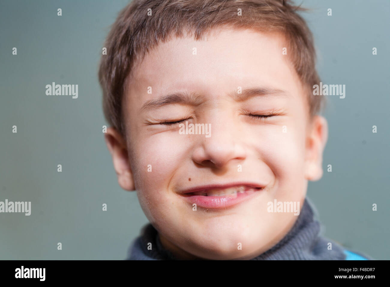 boy with her eyes closed Stock Photo - Alamy