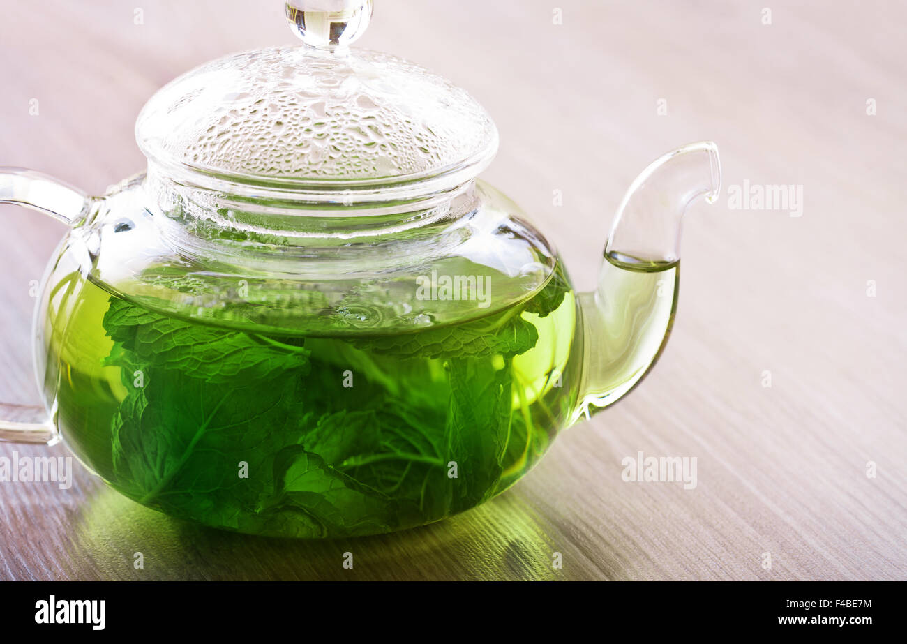 Teapot and peppermint tea in a tea glass hi-res stock photography and ...