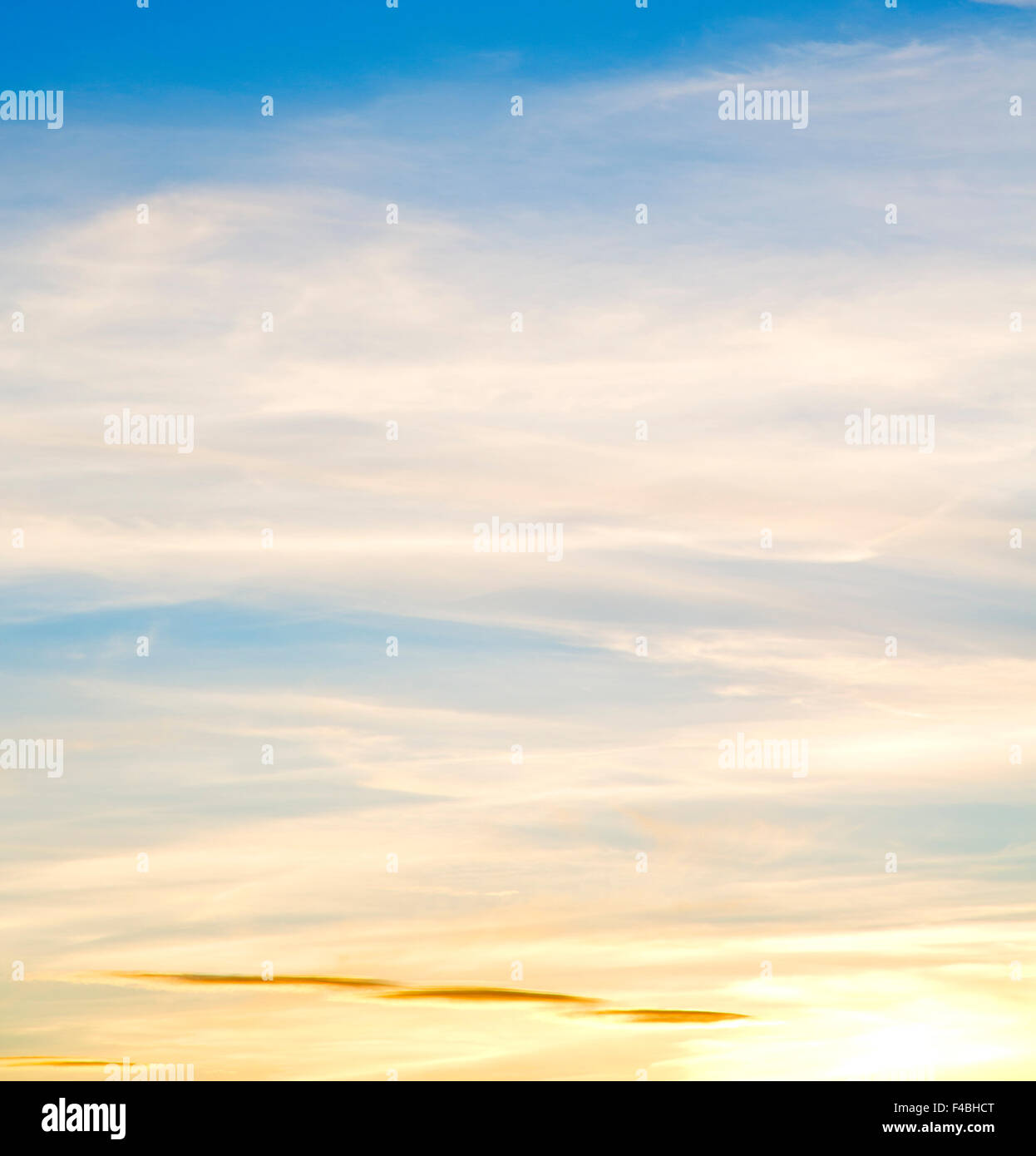 sunrise in the colored sky white soft clouds and abstract background ...