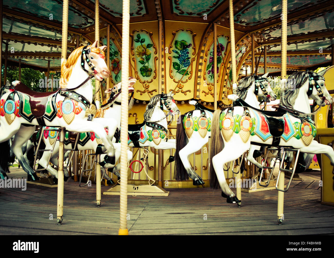 Horses on a carnival Merry Go Round Stock Photo - Alamy