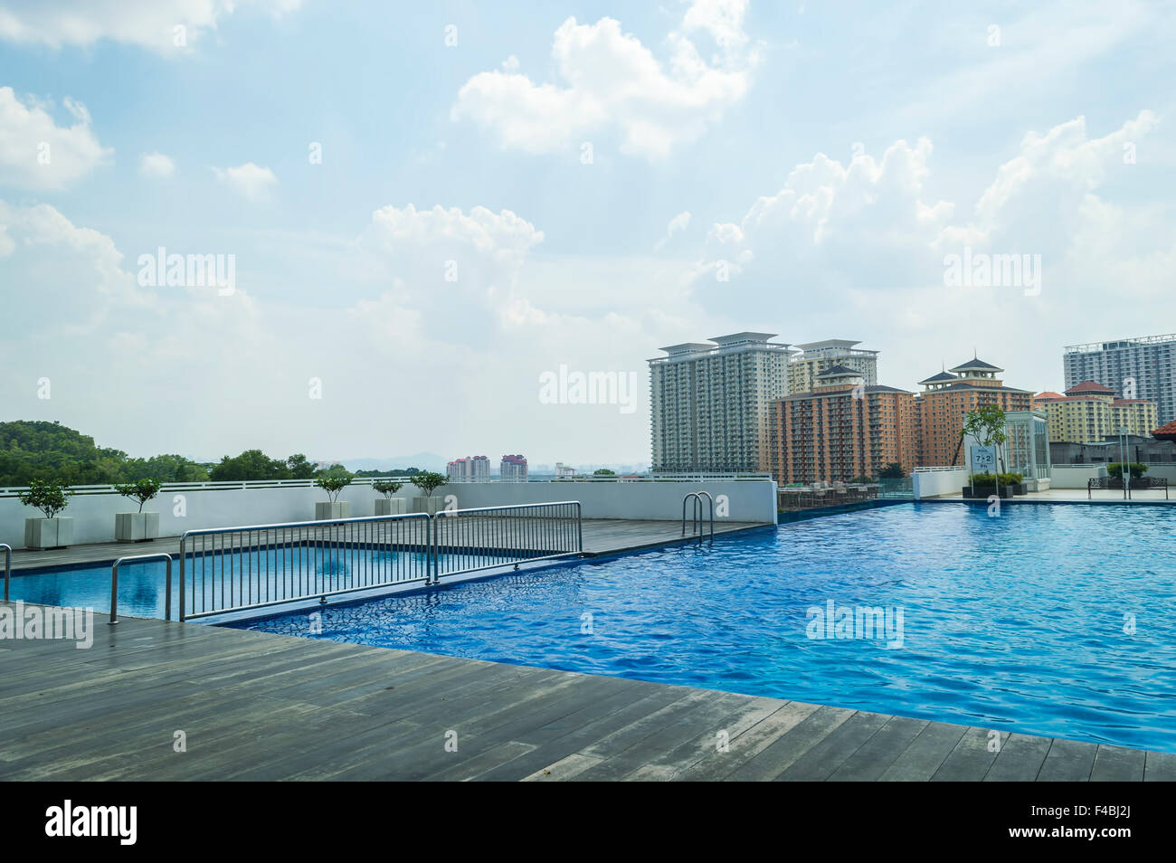 Wooden platform at swimming pool Stock Photo - Alamy