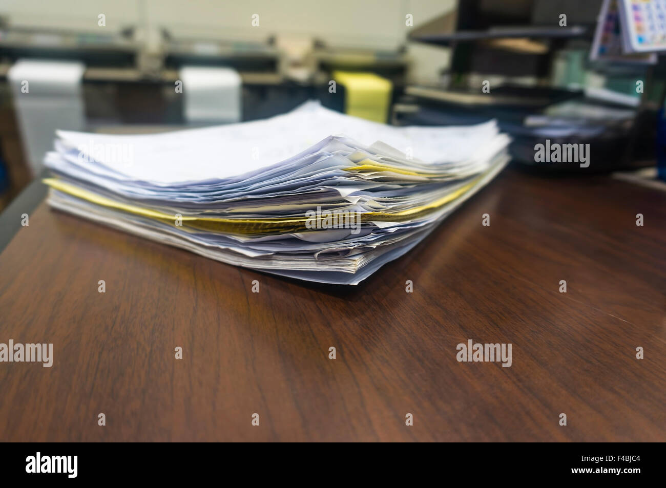 stack of paper on the desk Stock Photo - Alamy