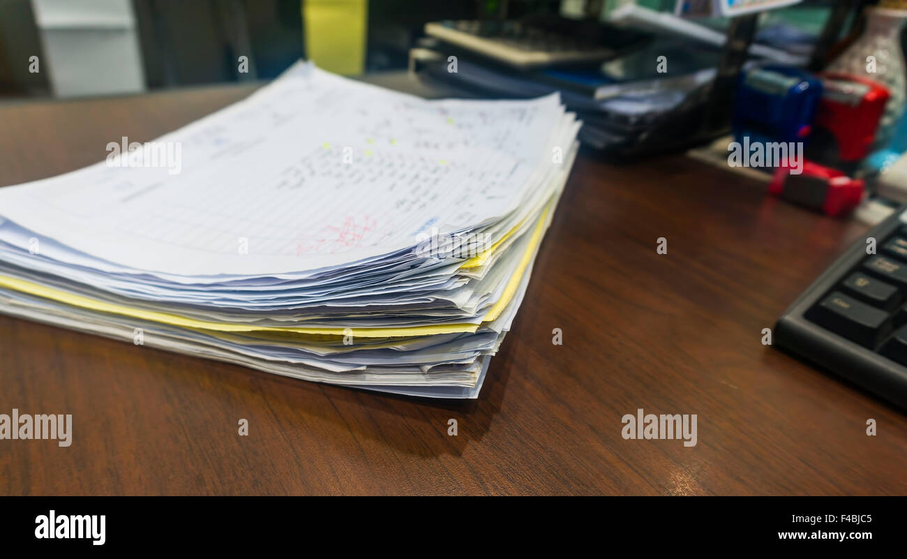 stack of paper on the desk Stock Photo - Alamy