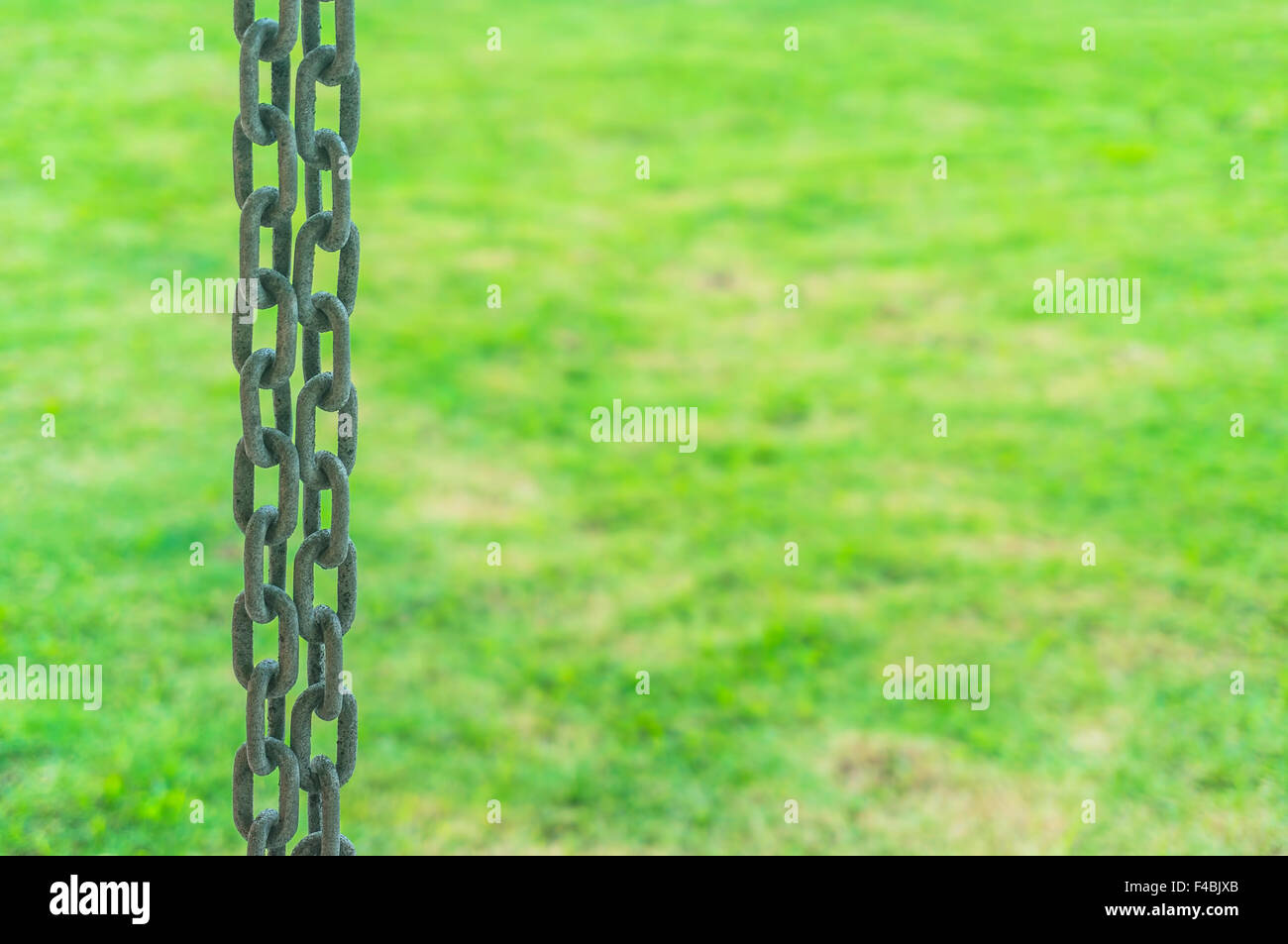 Chain Links - Shows a closeup of a metal chain link segment isolated ...