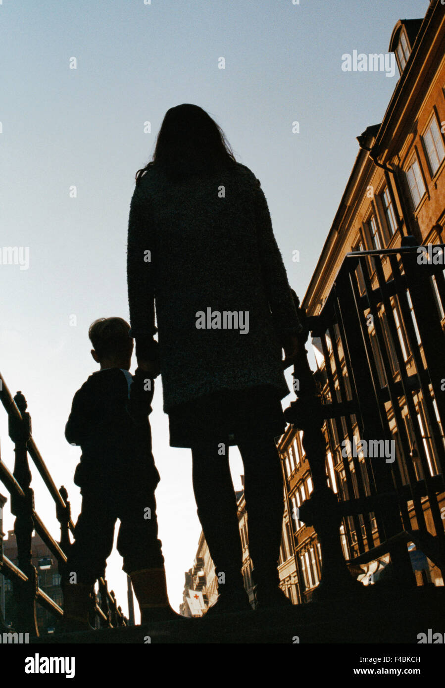 Woman and boy out walking Stock Photo - Alamy