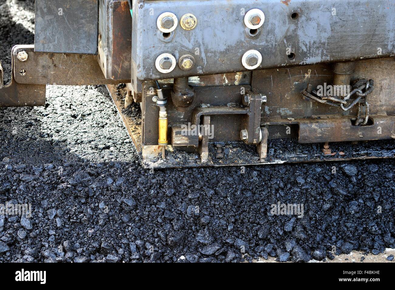 Built asphalt road machine Stock Photo - Alamy