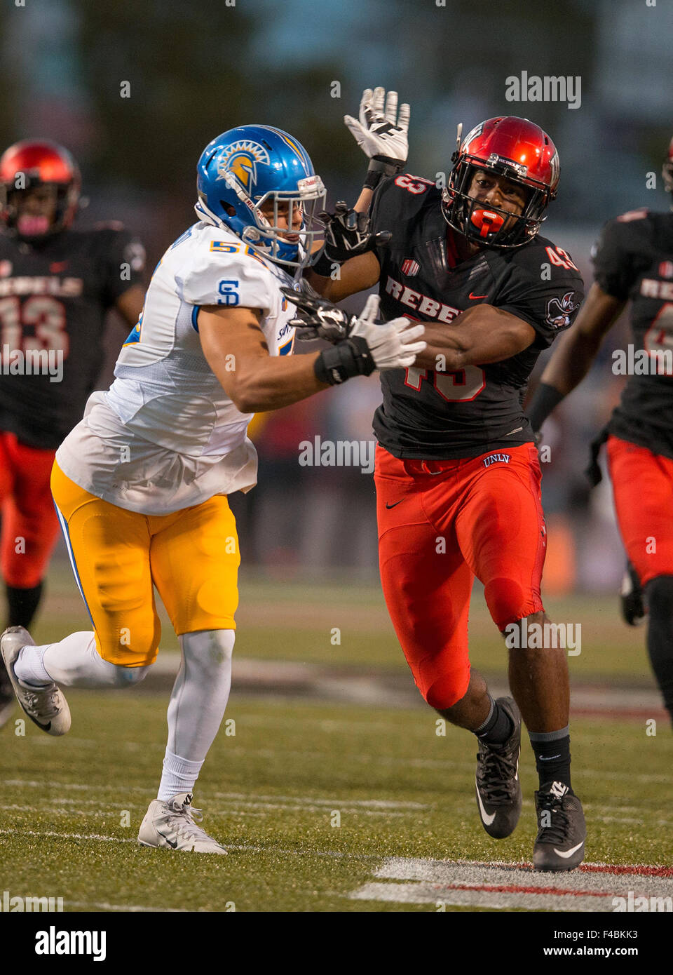 Las Vegas, NV, USA. 10th Oct, 2015. UNLV linebacker (43) Najee Johnson battles SJSU linebacker ...