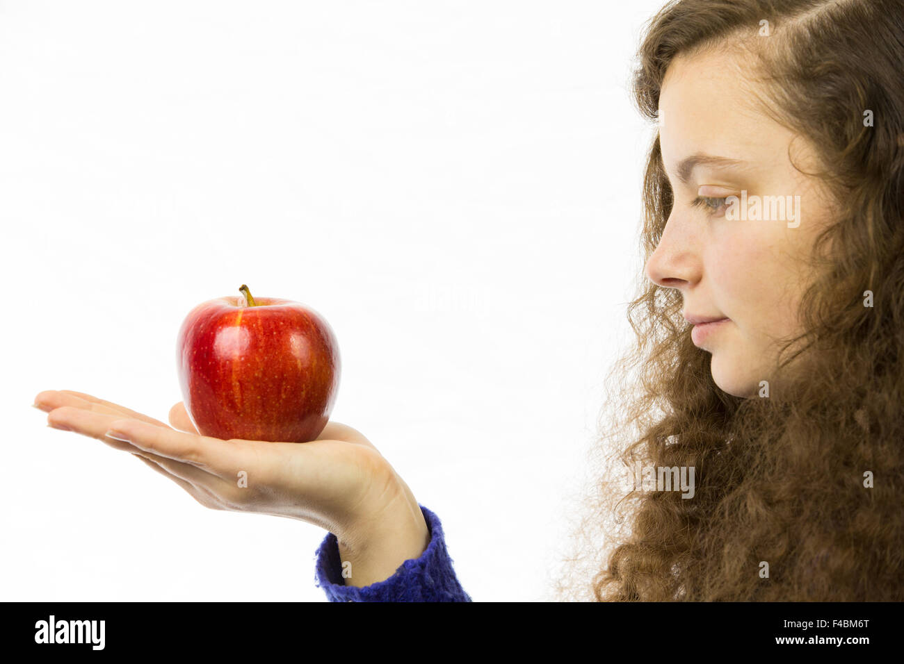 Girl with apple 10 Stock Photo - Alamy