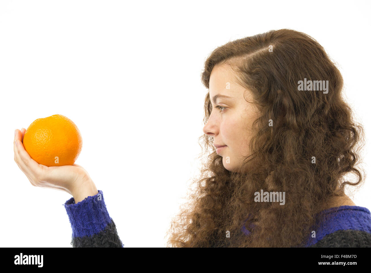 Girl with orange 1 Stock Photo - Alamy