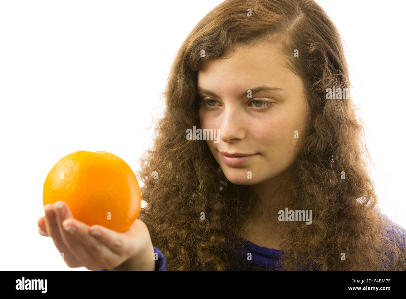 Girl with orange 4 Stock Photo - Alamy