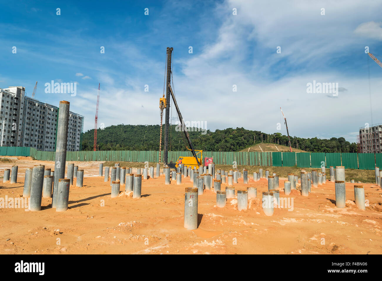 Stack of pile for base construction work Stock Photo - Alamy