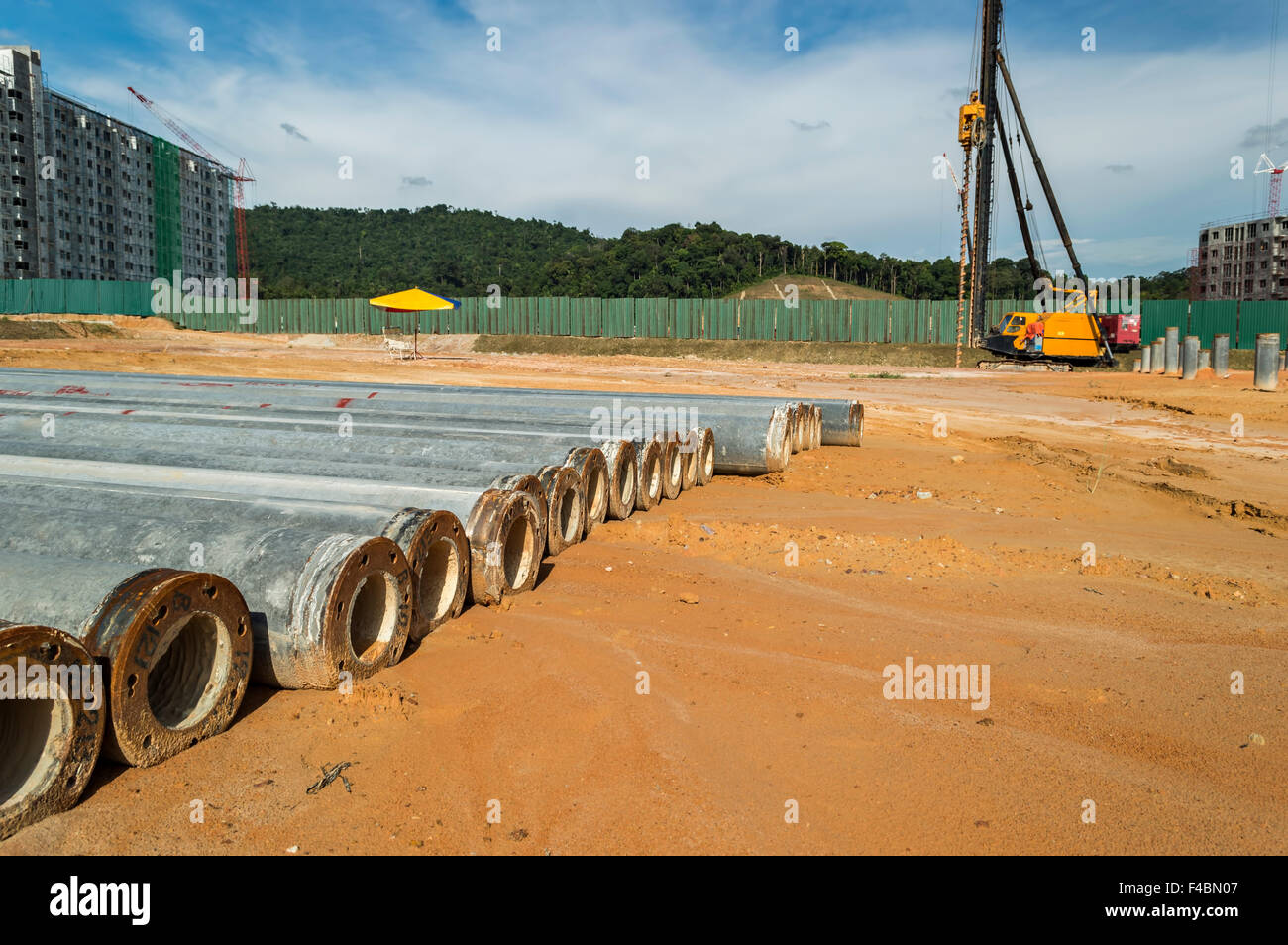 Stack of pile for base construction work Stock Photo - Alamy