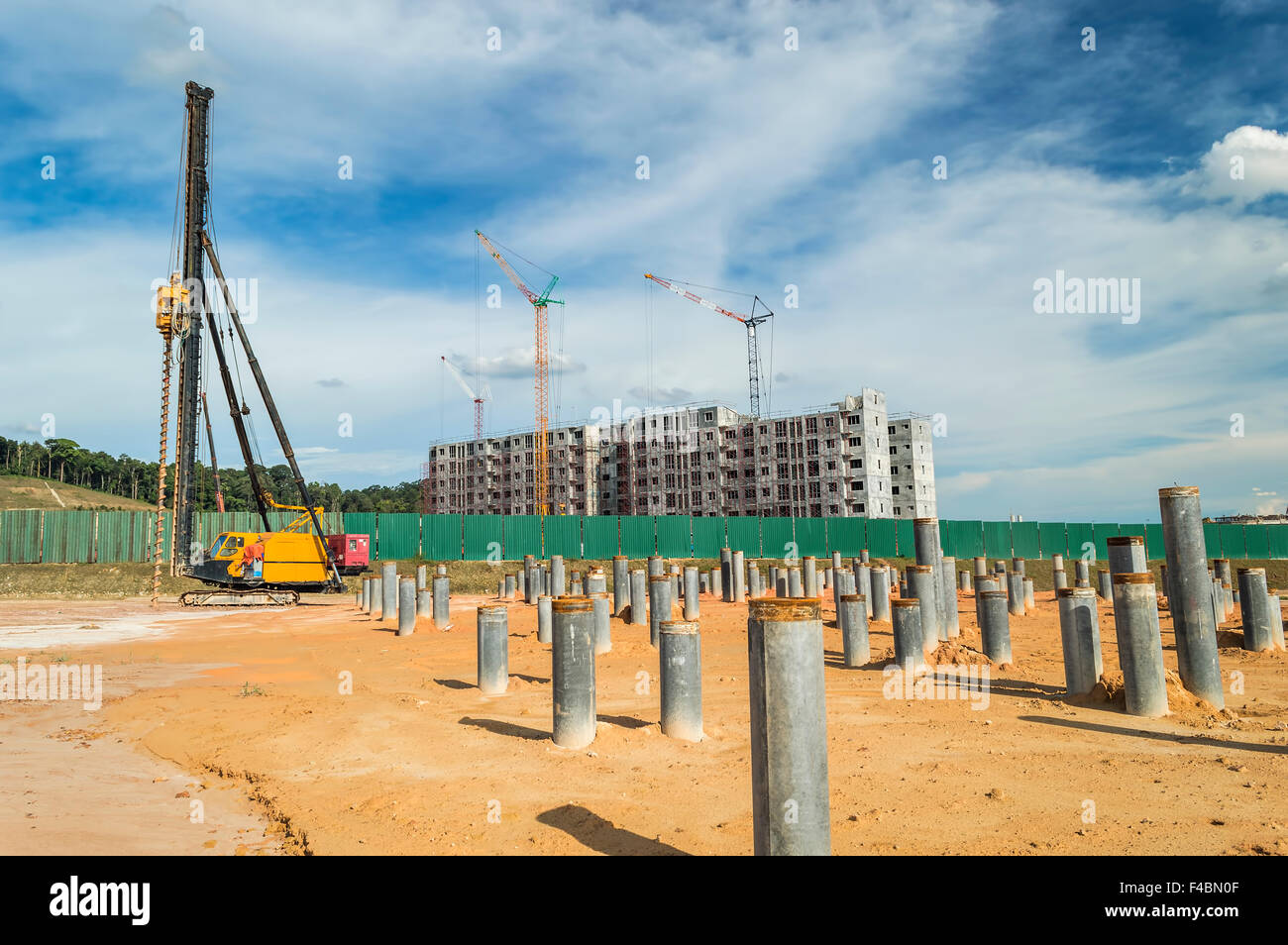 Stack of pile for base construction work Stock Photo - Alamy