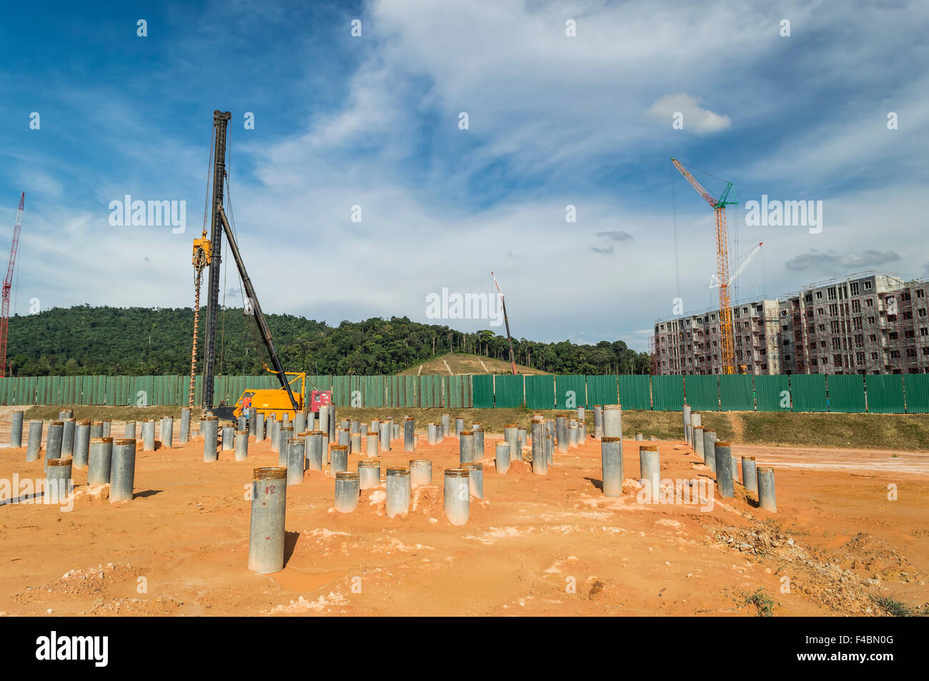 Stack of pile for base construction work Stock Photo - Alamy