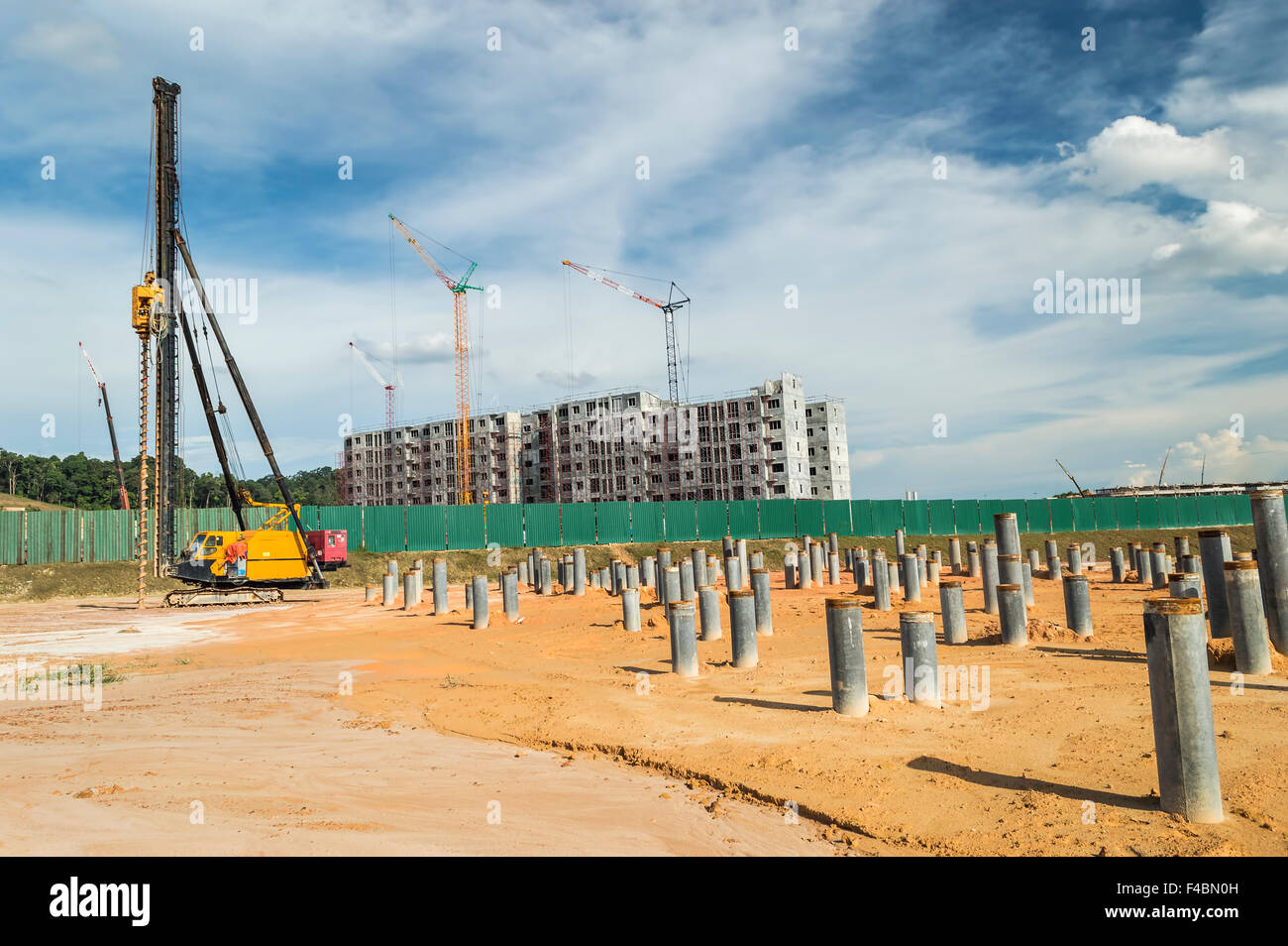 Stack of pile for base construction work Stock Photo - Alamy
